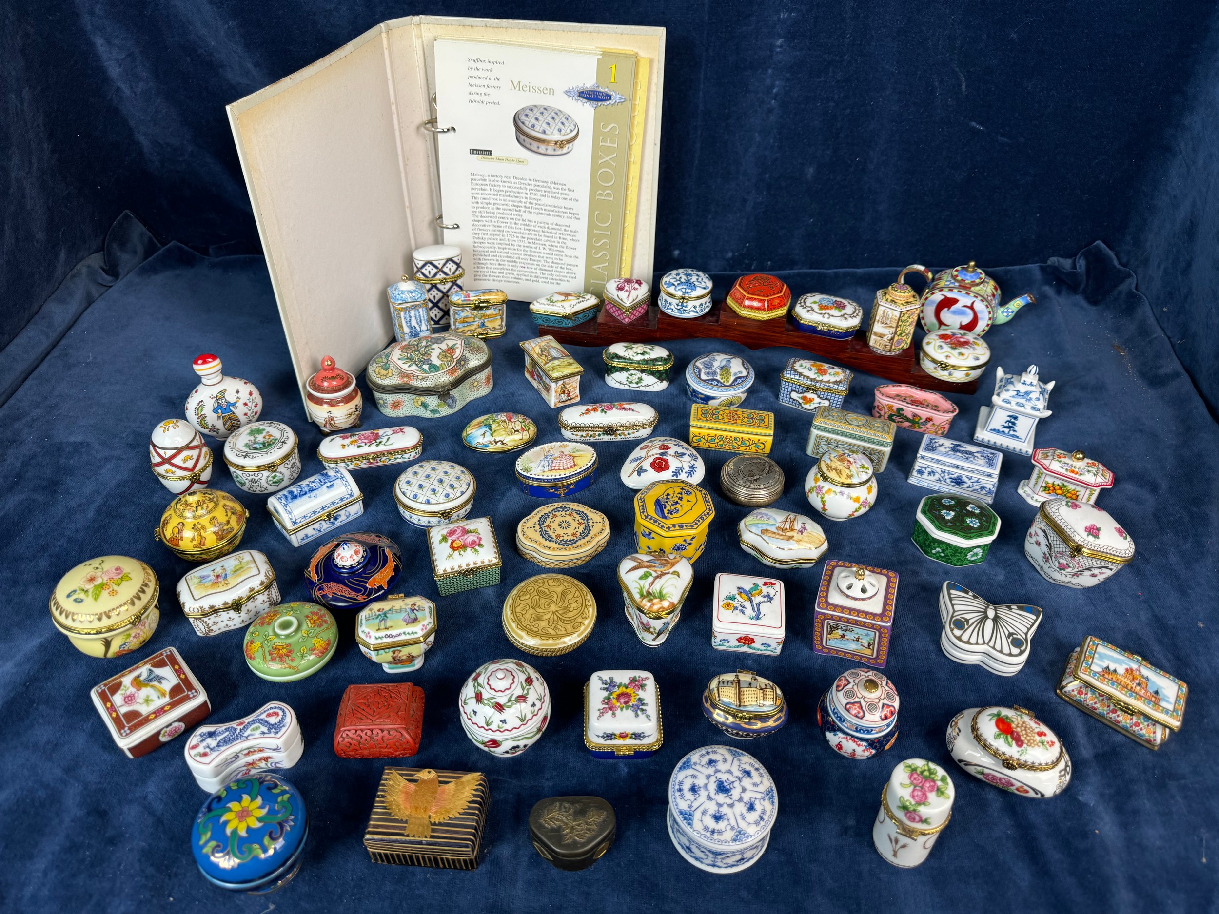 A large collection of Del Prado porcelain trinket boxes in various ...