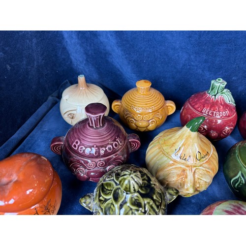 A collection of faced condiment pots, including 2 Sylvac crying onions ...