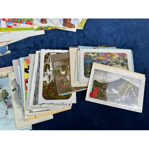 A quantity of vintage greetings cards and postcards, being a mix of ...