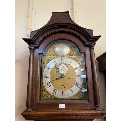An 18th century bonnet top longcase clock in oak case having locking ...