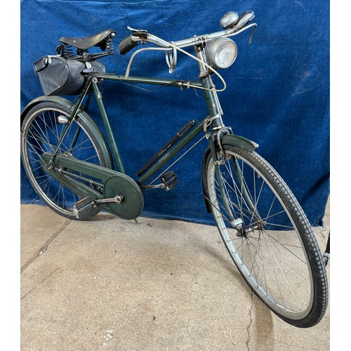 A vintage gents Raleigh bicycle, with a green coloured frame, the ...