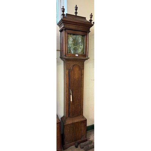 An unusual 18th century oak cased, longcase clock, with brass and ...