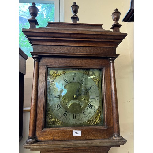 An unusual 18th century oak cased, longcase clock, with brass and ...