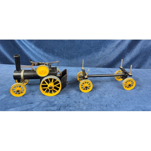 A Mamod steam traction engine and a Mamod log trailer wagon.