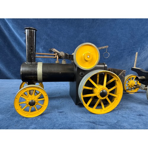 A Mamod steam traction engine and a Mamod log trailer wagon.