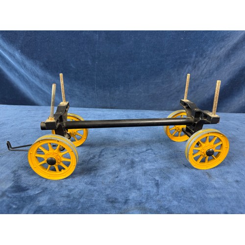 A Mamod steam traction engine and a Mamod log trailer wagon.