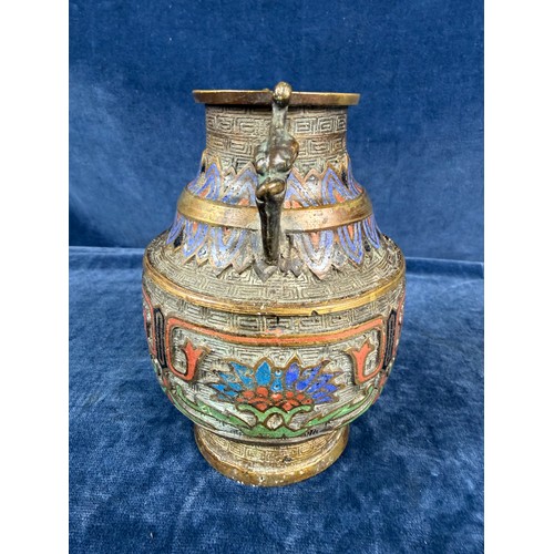 A Japanese bronze champleve enamel vase with twin handles and floral ...