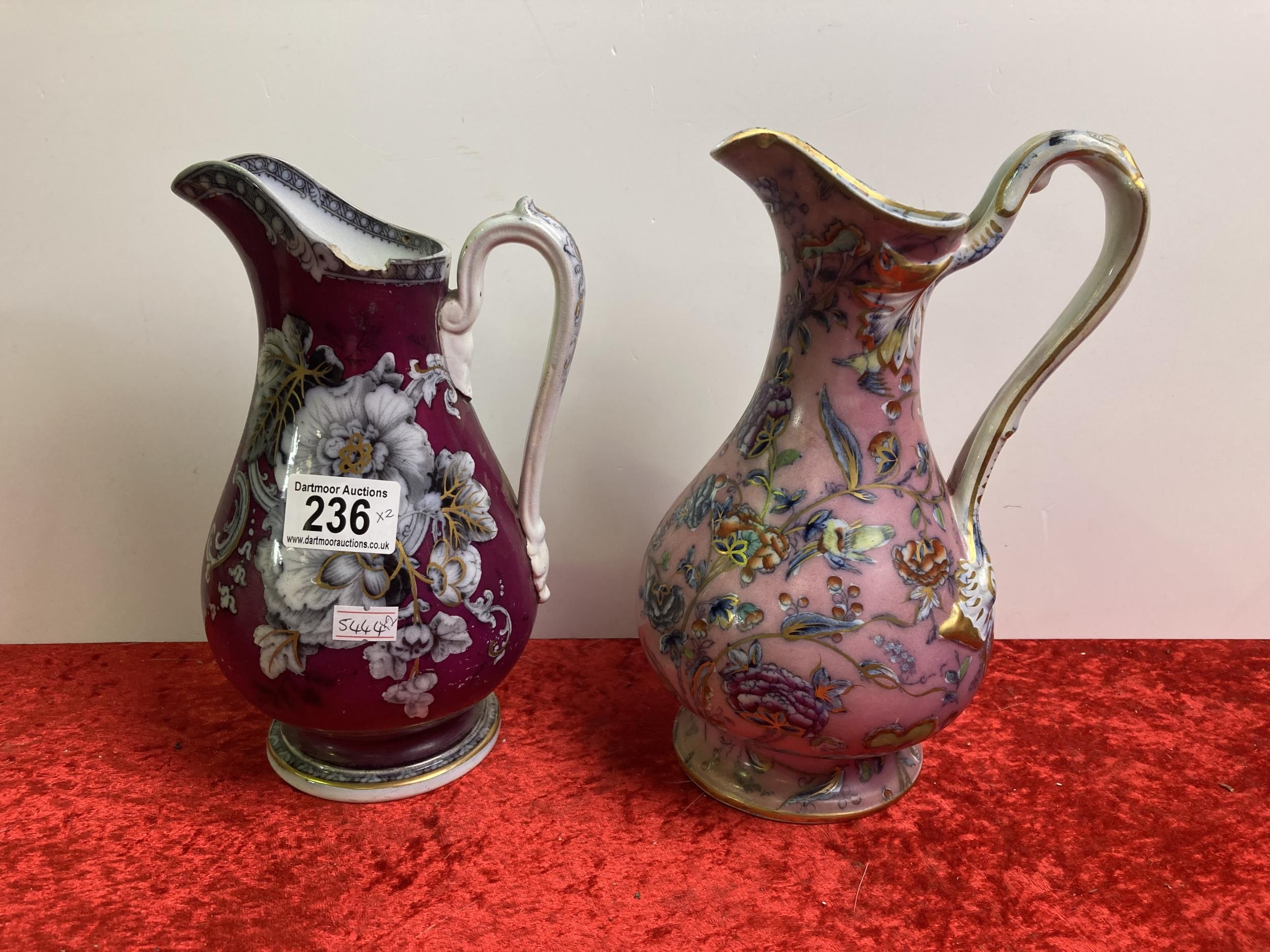 Pair of decorative hand-painted jugs. Approx 25cm tall