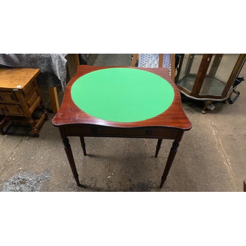 Pretty swivel top game table. Fold down to half size. Green baize ...