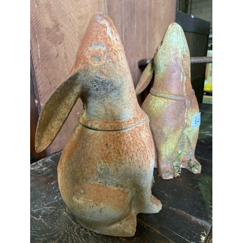 Lovely pair of heavy cast iron garden sculpture rabbits 30 cm tall