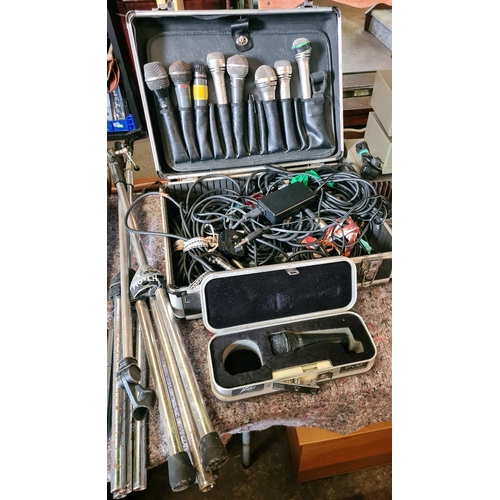 Aluminium case containing several microphones and leads with adapters ...