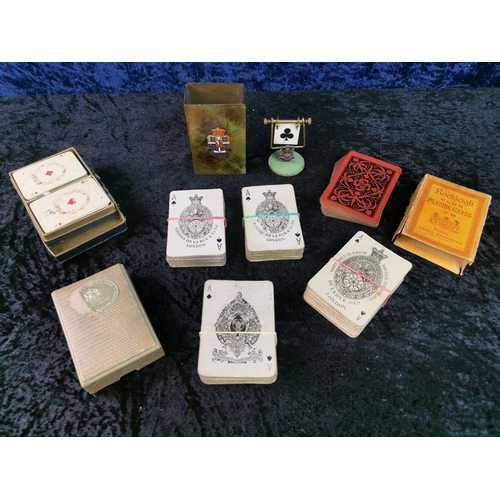A collection of antique playing cards, a ‘no trumps’ card playing ...
