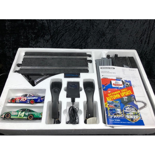 Never used Scalextric NASCAR Speedway Set, 1:32 scale slot car racing set.