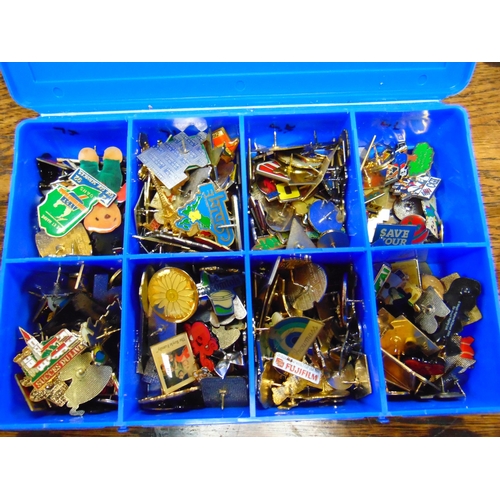 Collection of pin badges.