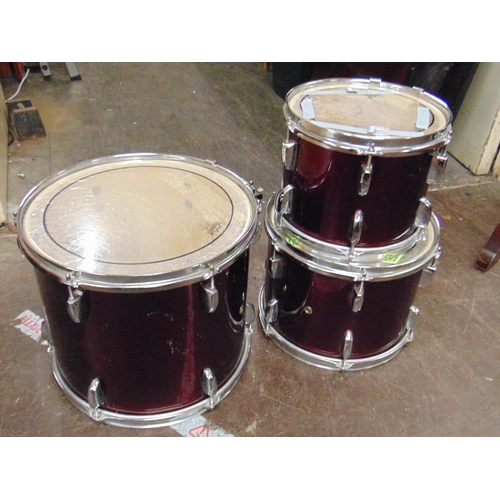Pearl three piece drum kit.