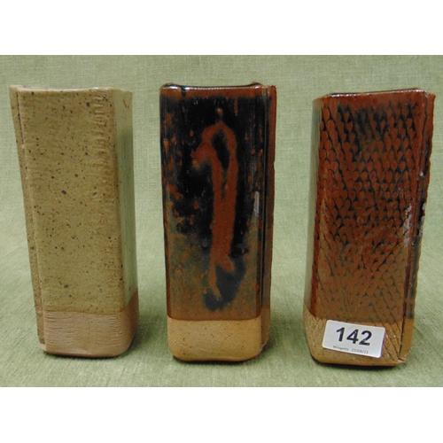 Three studio pottery vases, of rectangular form, each 7" high.
