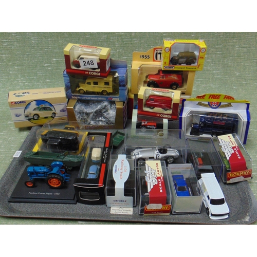 Quantity of boxed collectable model vehicles.
