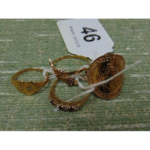 Four 9ct gold rings.