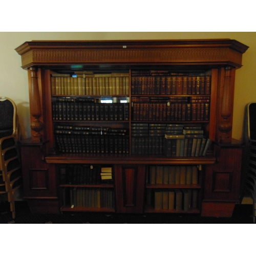 Impressive bookcase, ogive cornice, moulded reeded columns, and shelf ...