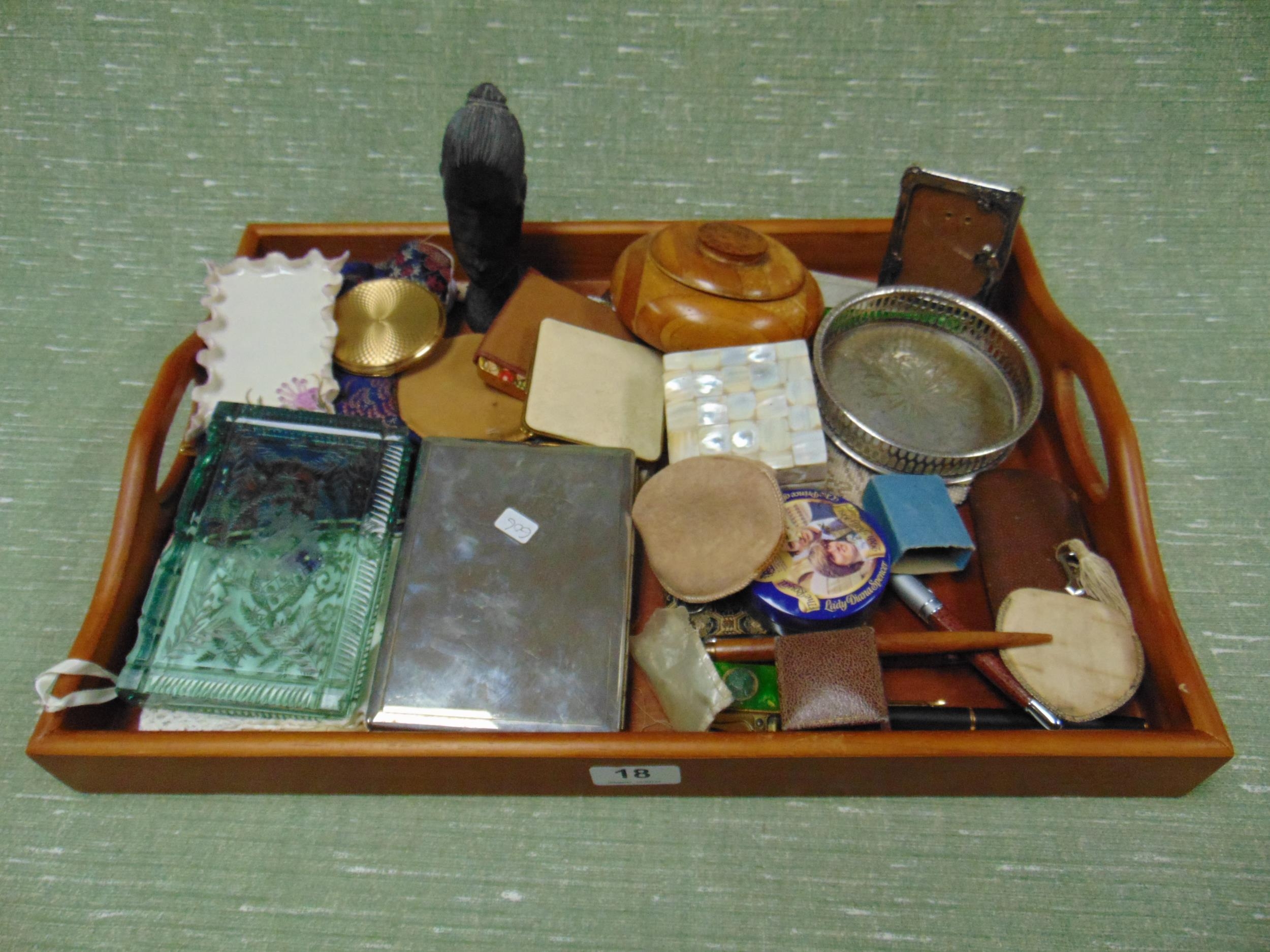 Interesting tray of trinkets.