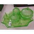 Green glass dressing table set.