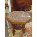 Balinese type two tier centre table, 19.5" high.