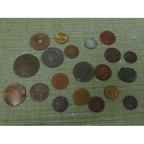 Collection of old copper coins and medallions.