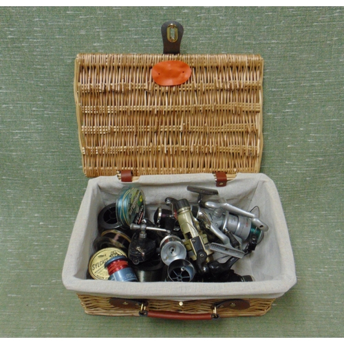 Collection of fishing reels.