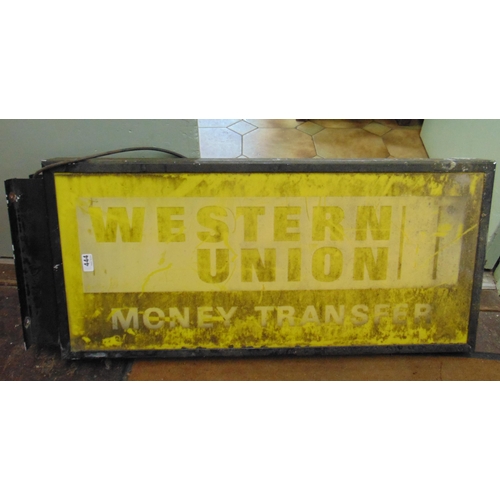 Western credit union illuminated sign.