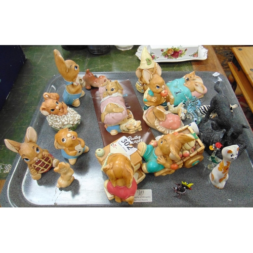 Collection of Pendelfin rabbit figures.