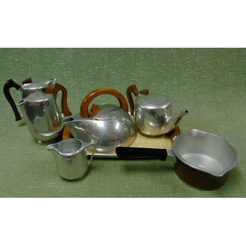 Picquot ware tea set, having additional pieces.