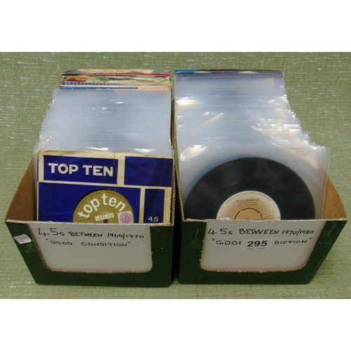 Two boxes of 45 single records.