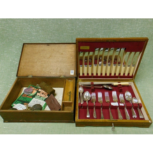 An oak cutlery box and contents and one other.