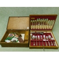 An oak cutlery box and contents and one other.