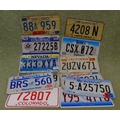 Collection of reproduction American number plates.