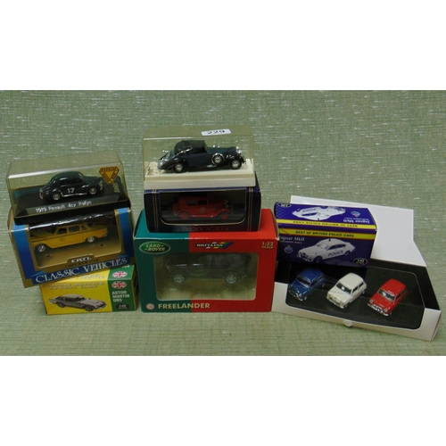 Small quantity of boxed collectable model vehicles.