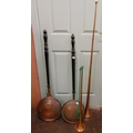 Two warming pans and two coaching horns.