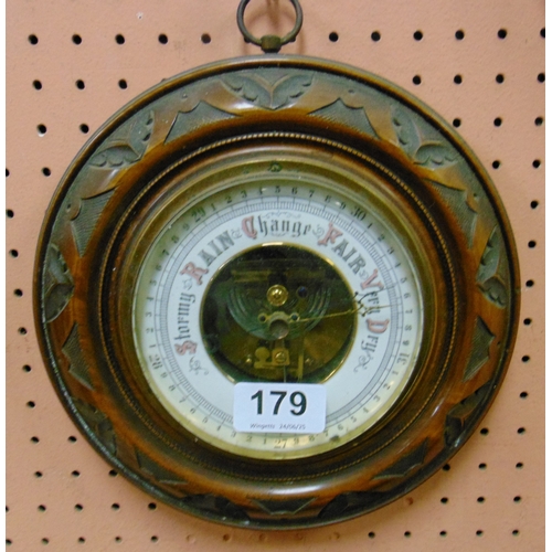 Walnut cased circular barometer, 9" dia.