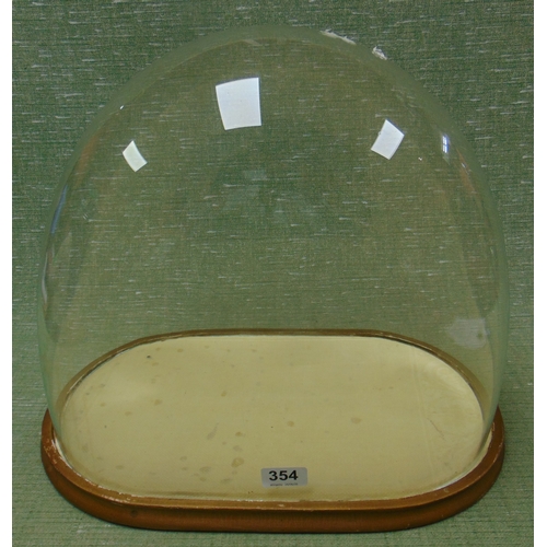 Antique glass dome, 15" high.