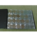 An album containing a quantity of collectable football coins.