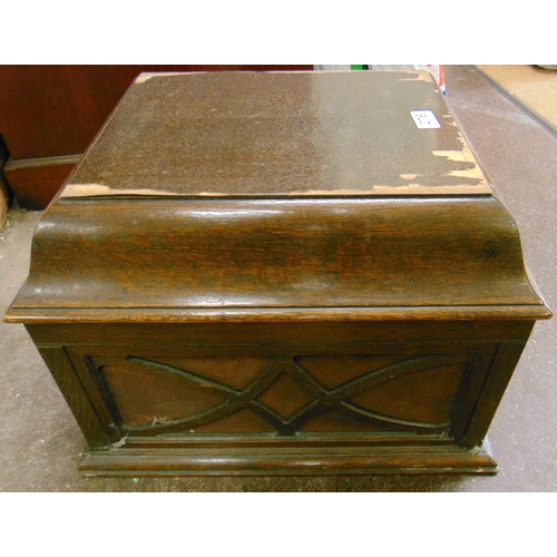 An oak cased His master's voice record player.
