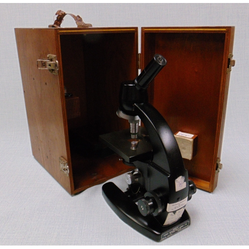 Cased vintage microscope.