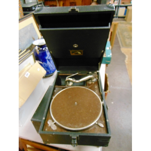 Cased His masters voice table top record player.
