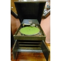 An oak cased tabletop record player.