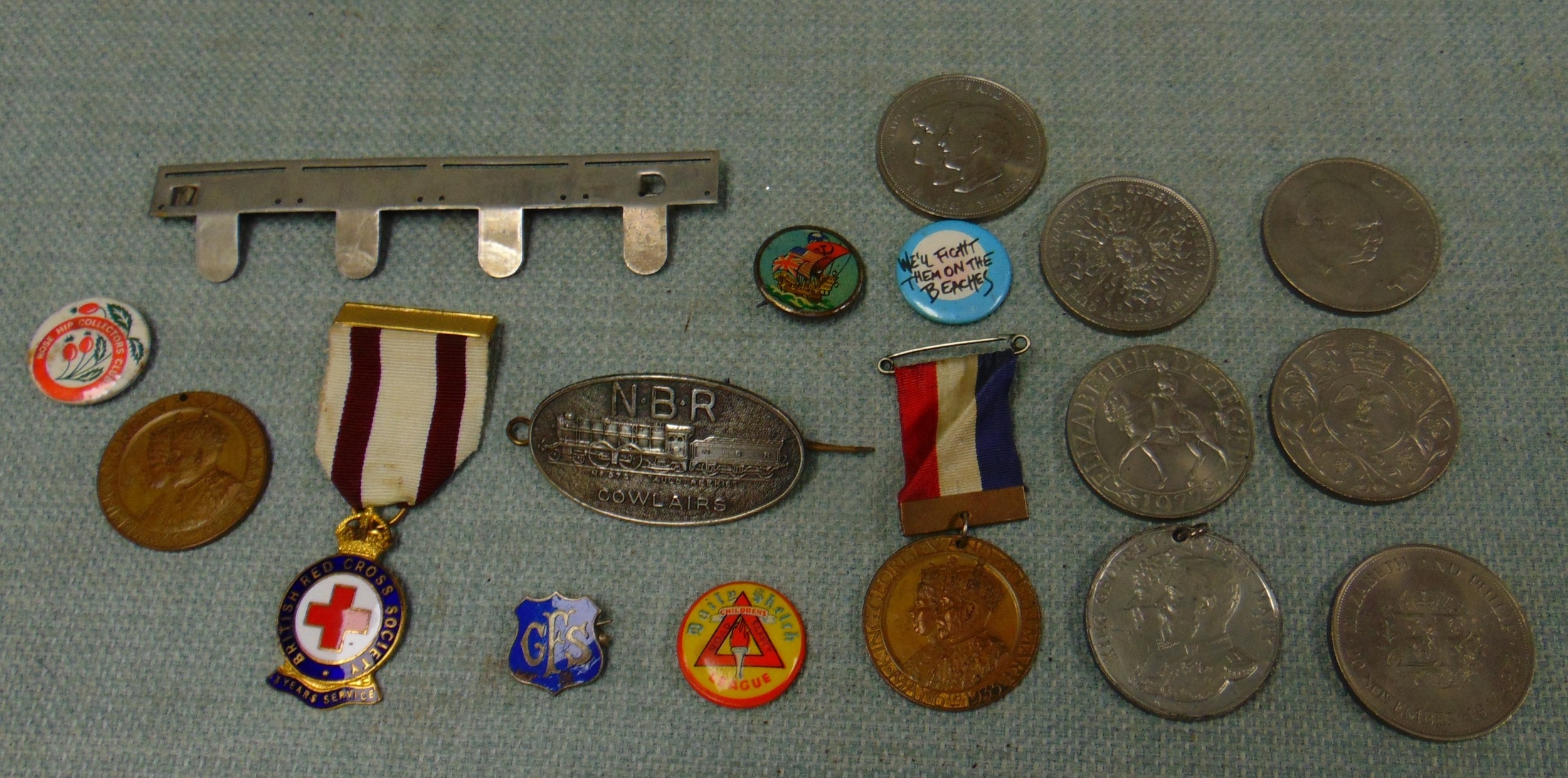 Various badges, coins, etc.