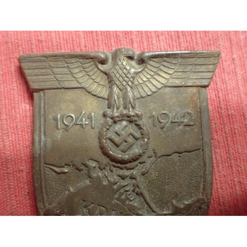 WW2 German 1941-42 Krim shield In steel with a bronzed finish.