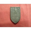 WW2 German 1942 Cholm shield Light untouched patina. All four fixing ...