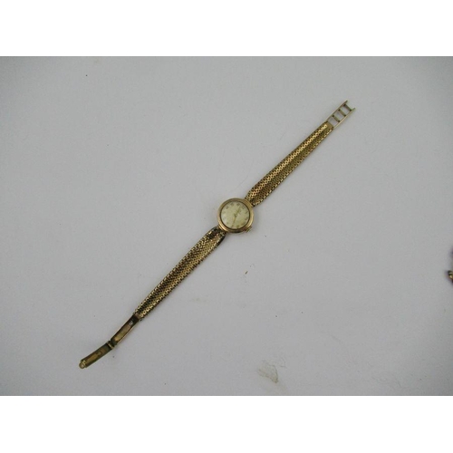 A 9ct Omega ladies watch, with woven bracelet and ladder clasp, stamped ...