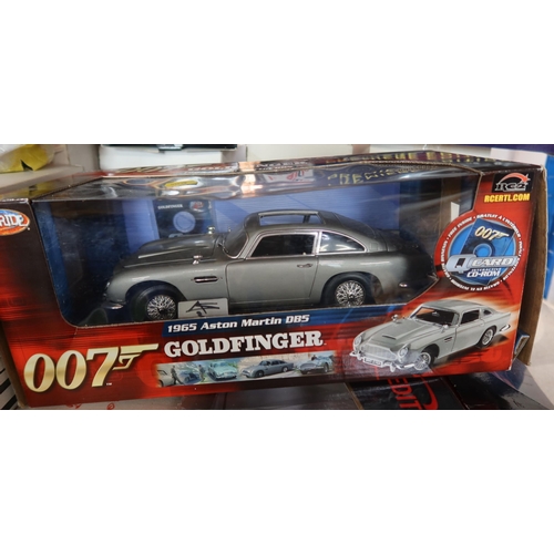 A collection of boxed car models (16)
