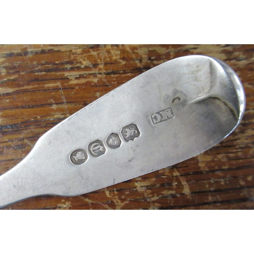 A collection of silver fiddle pattern flatware, all engraved with an ...